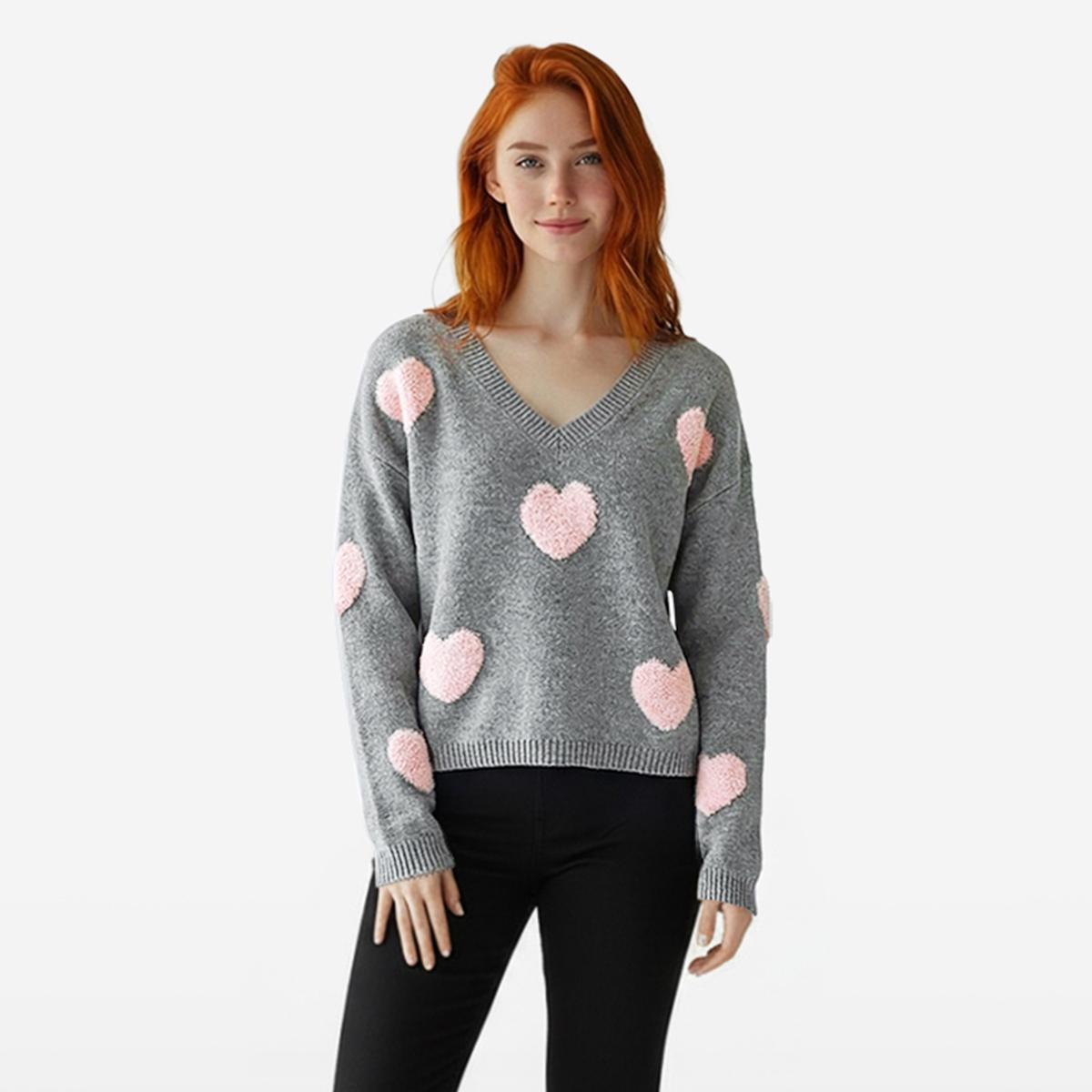 Click here for Juniors No Comment Boucle Heart Motif V Neck Pull... prices